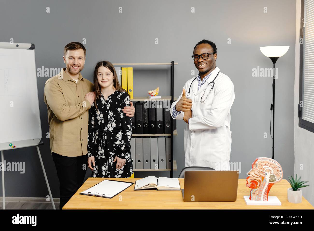 Group of people standing in front of whiteboard in doctors offices ...