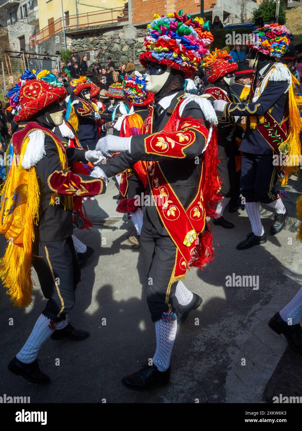 Balari dancing in Bagolino streets during Carnival, wearing the ...