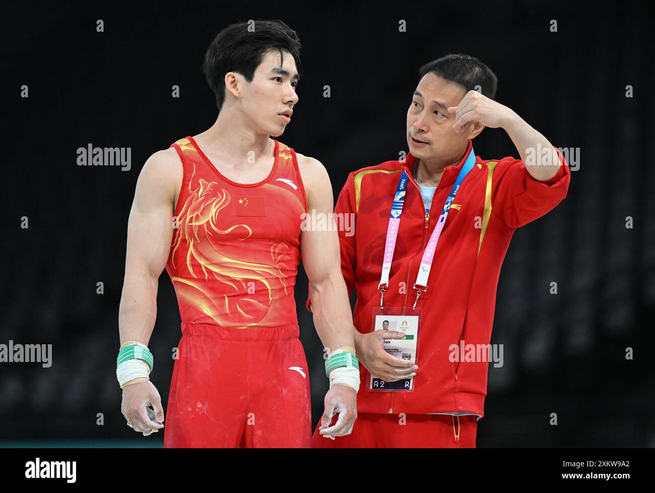 Paris, France. 24th July, 2024. Zhang Boheng (L) of the Chinese men's ...