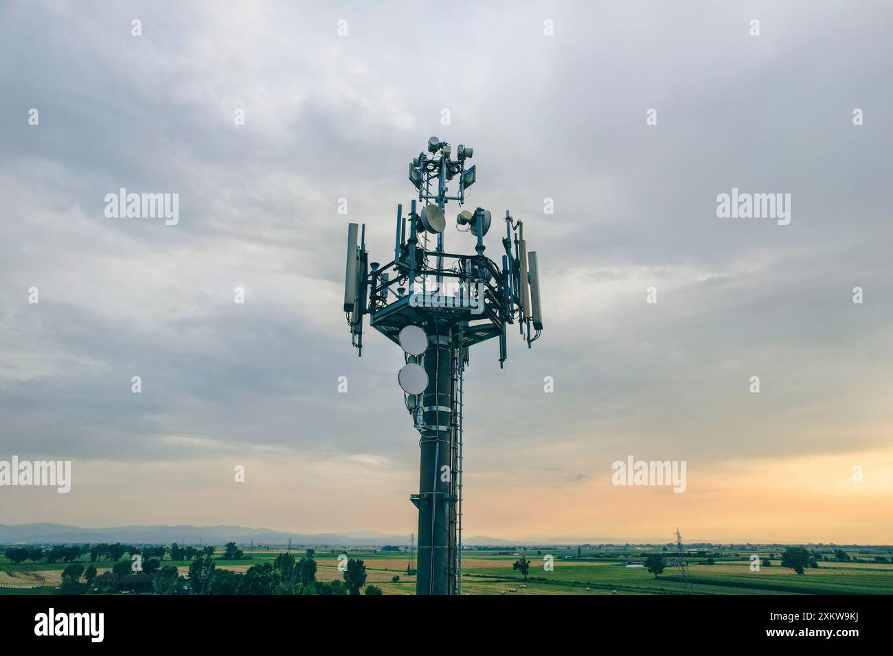 Aerial, Telecommunication tower with antennas over blue sky and white ...