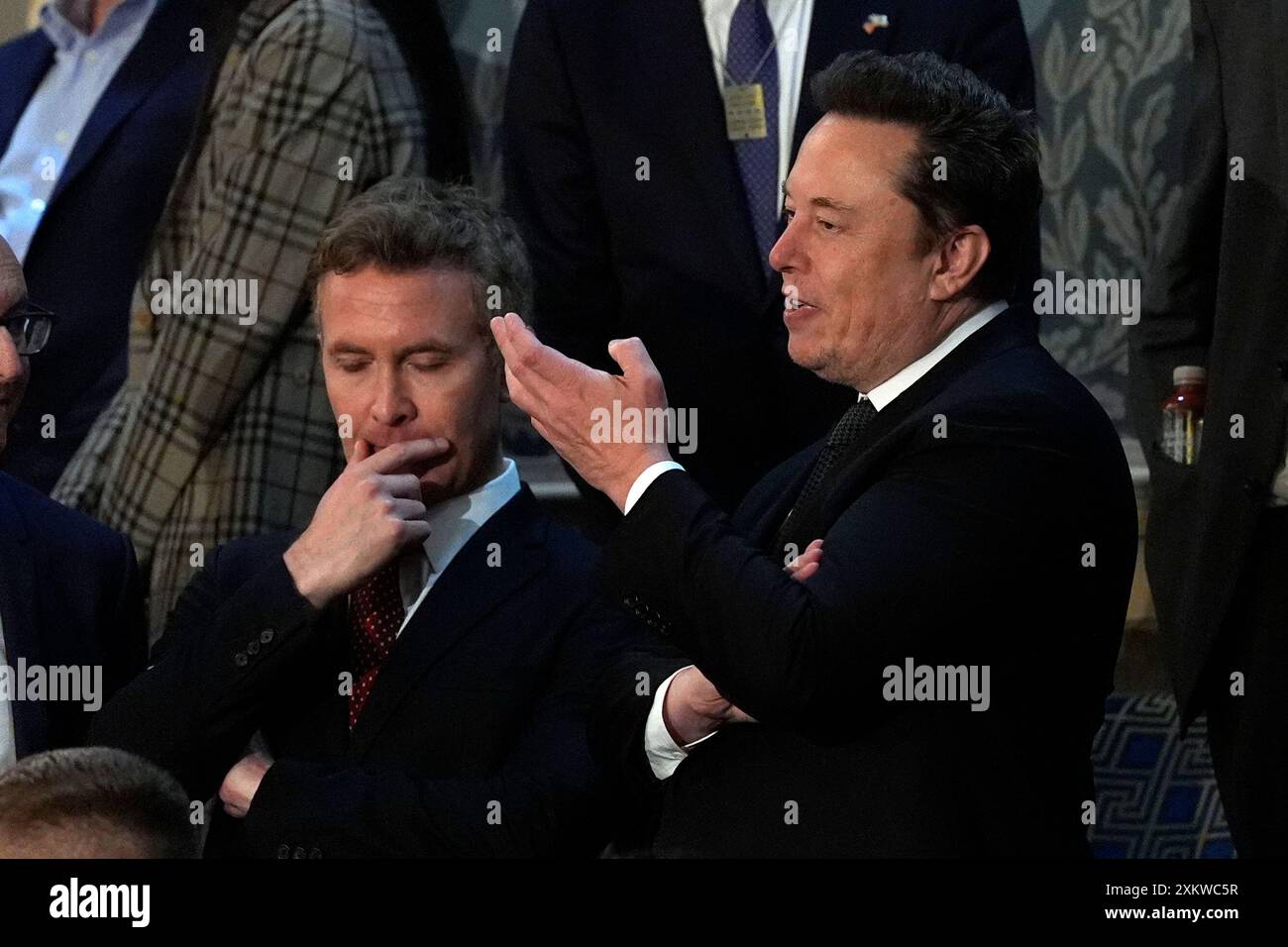 British author Douglas Murray talks with Elon Musk before Israeli Prime ...