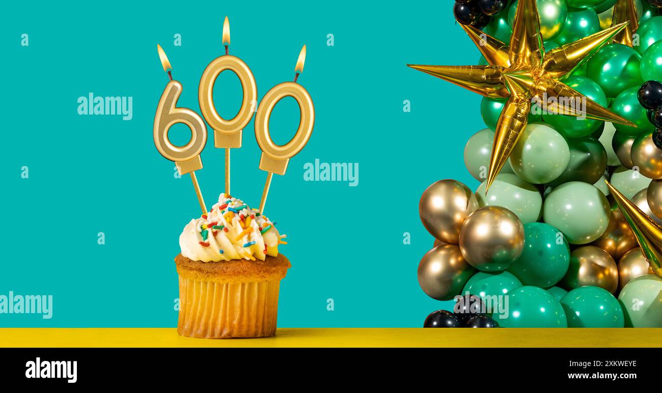 Birthday card number 600 - Cupcake with balloons Stock Photo - Alamy