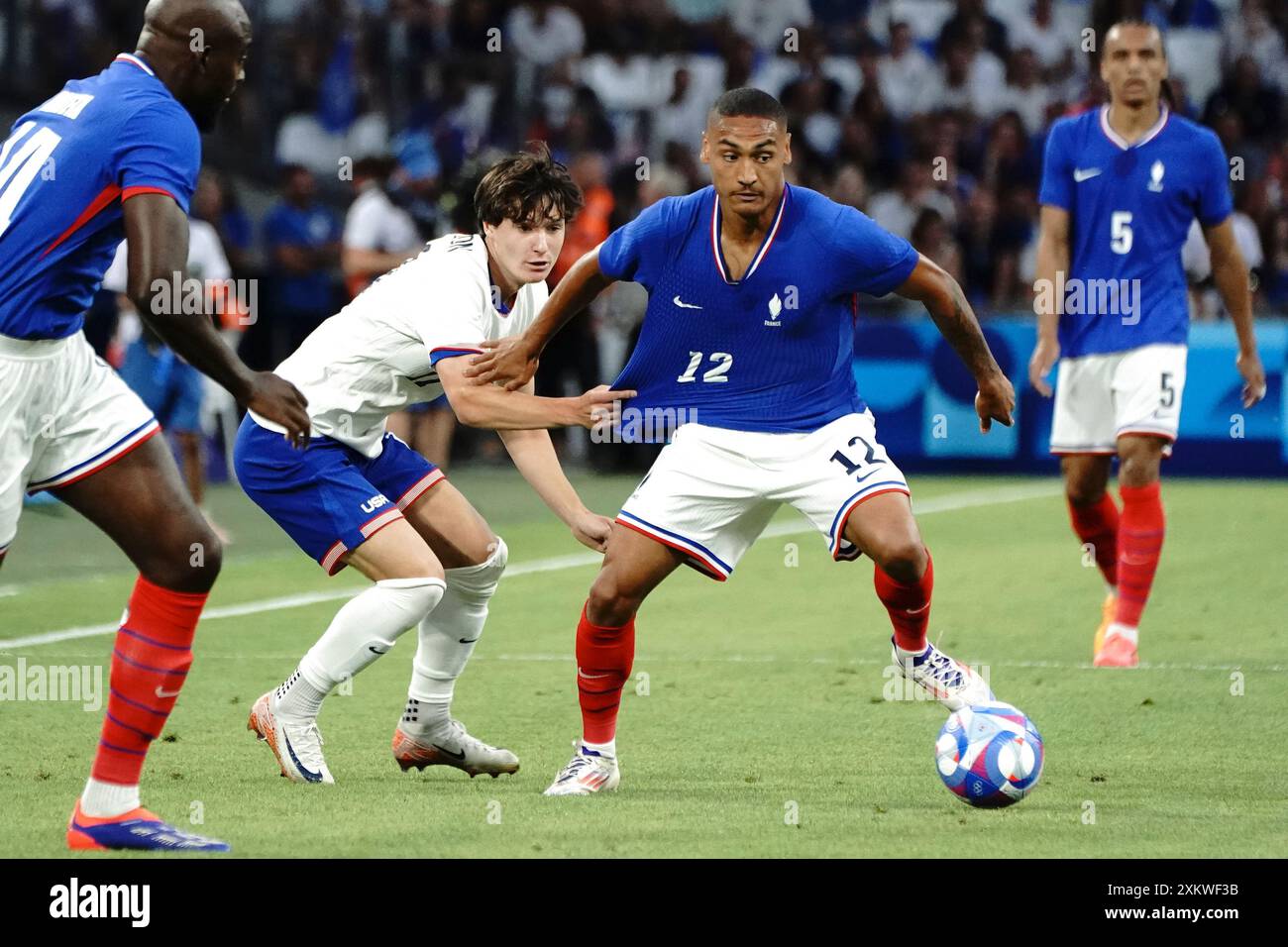 Enzo Millot (France) and Paxten Aaronson (USA) during the Football, Men ...