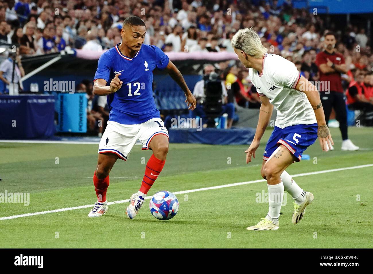 Enzo Millot (France) and John Tolkin (USA) during the Football, Men's Group A, between France ...
