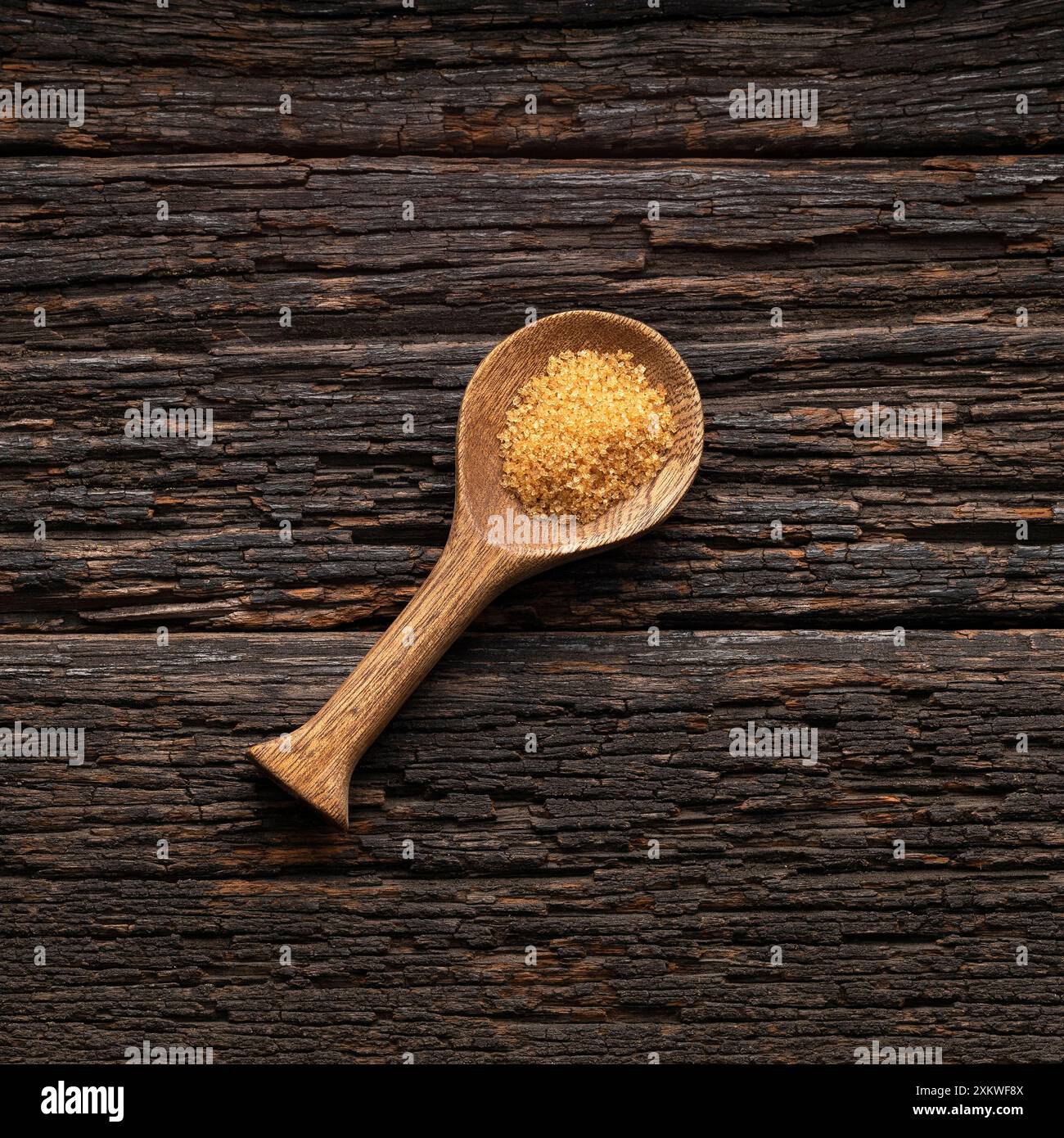 Organic cane panela powder in the spoon - Saccharum officinarum Stock ...