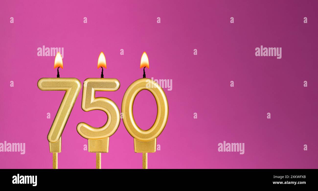 Candle number 750 in purple background - birthday card Stock Photo - Alamy
