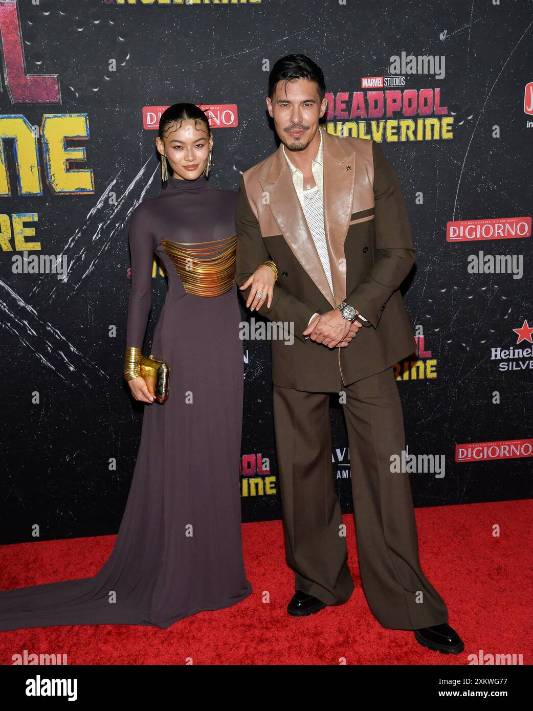 Lucy Qiu, left, and Lewis Tan attend the world premiere of Marvel ...
