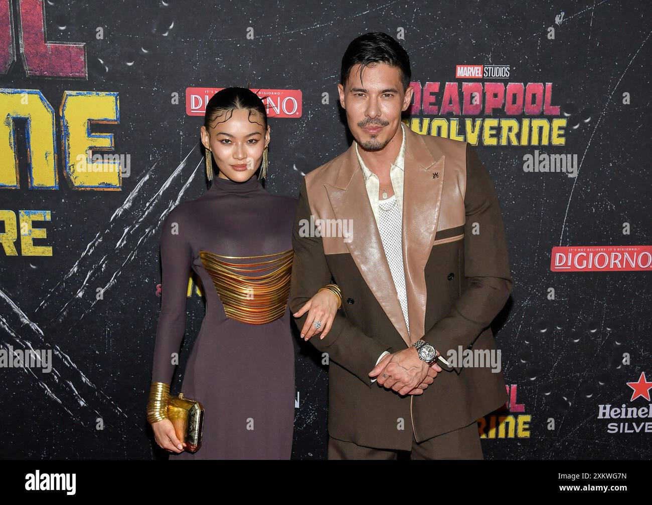 Lucy Qiu, left, and Lewis Tan attend the world premiere of Marvel ...