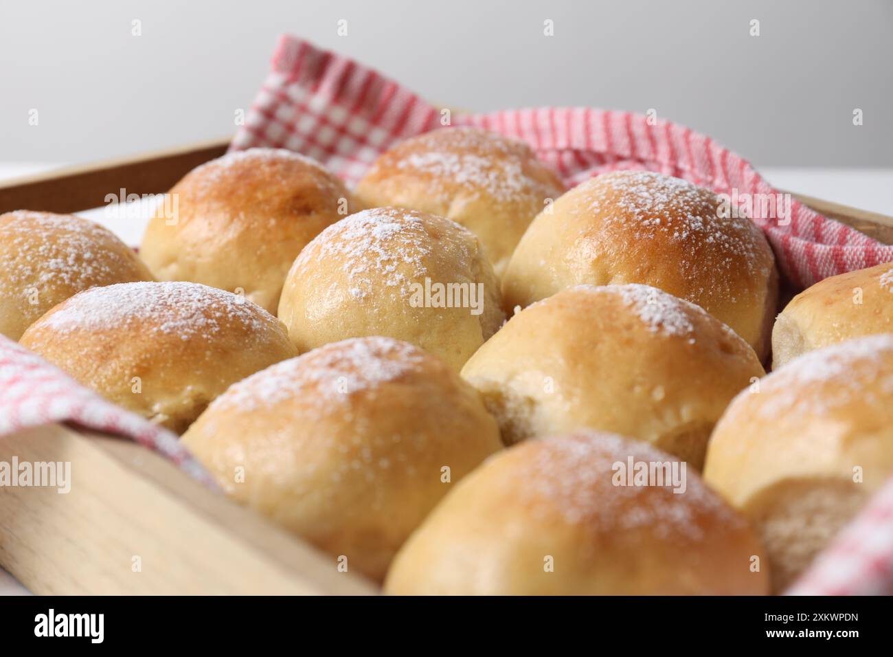 Delicious dough balls in wooden crate, closeup Stock Photo - Alamy