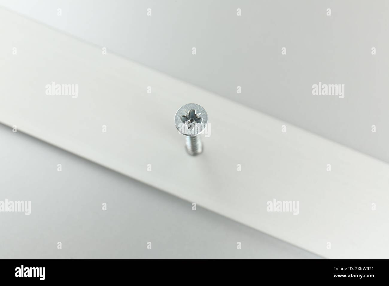 Screwing screw table surface screwdriver hi-res stock photography and ...