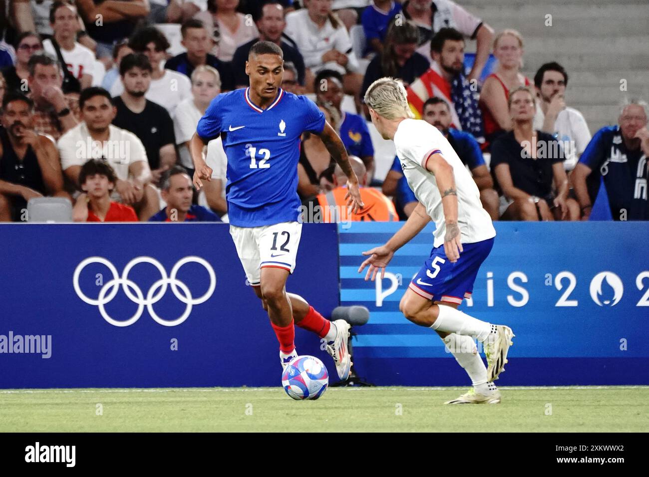 Enzo Millot (France) and John Tolkin (USA) during the Football, Men's Group A, between France ...