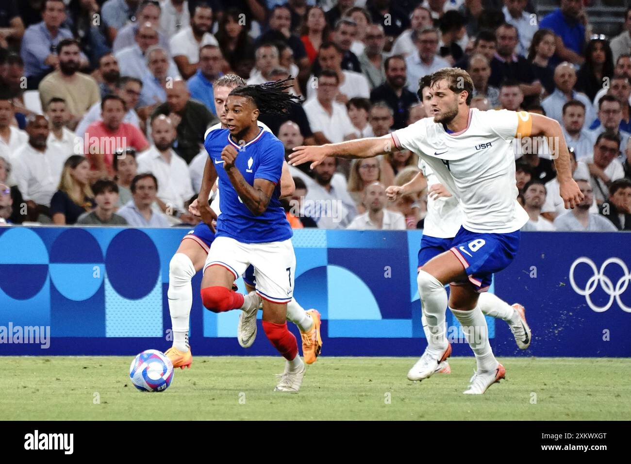 Michael Olise (France) and Tanner Tessmann (USA) during the Football ...