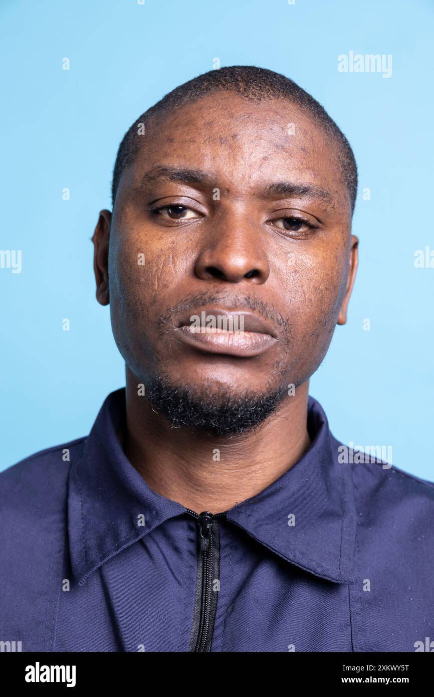 Portrait of cheerful confident security guard feels proud of his duties ...