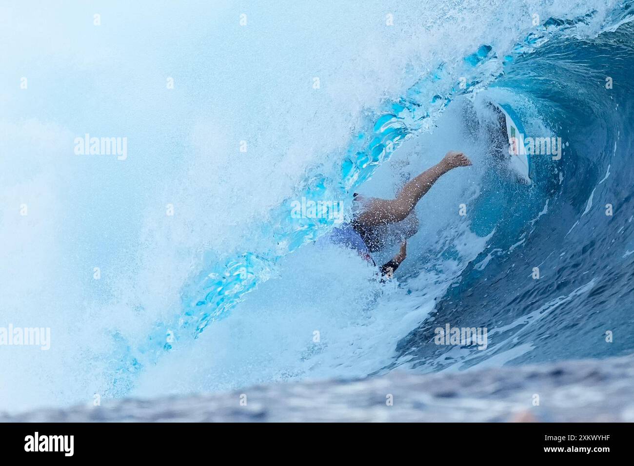 Yolanda Hopkins, of Portugal, falls as she surfs during a training day ...