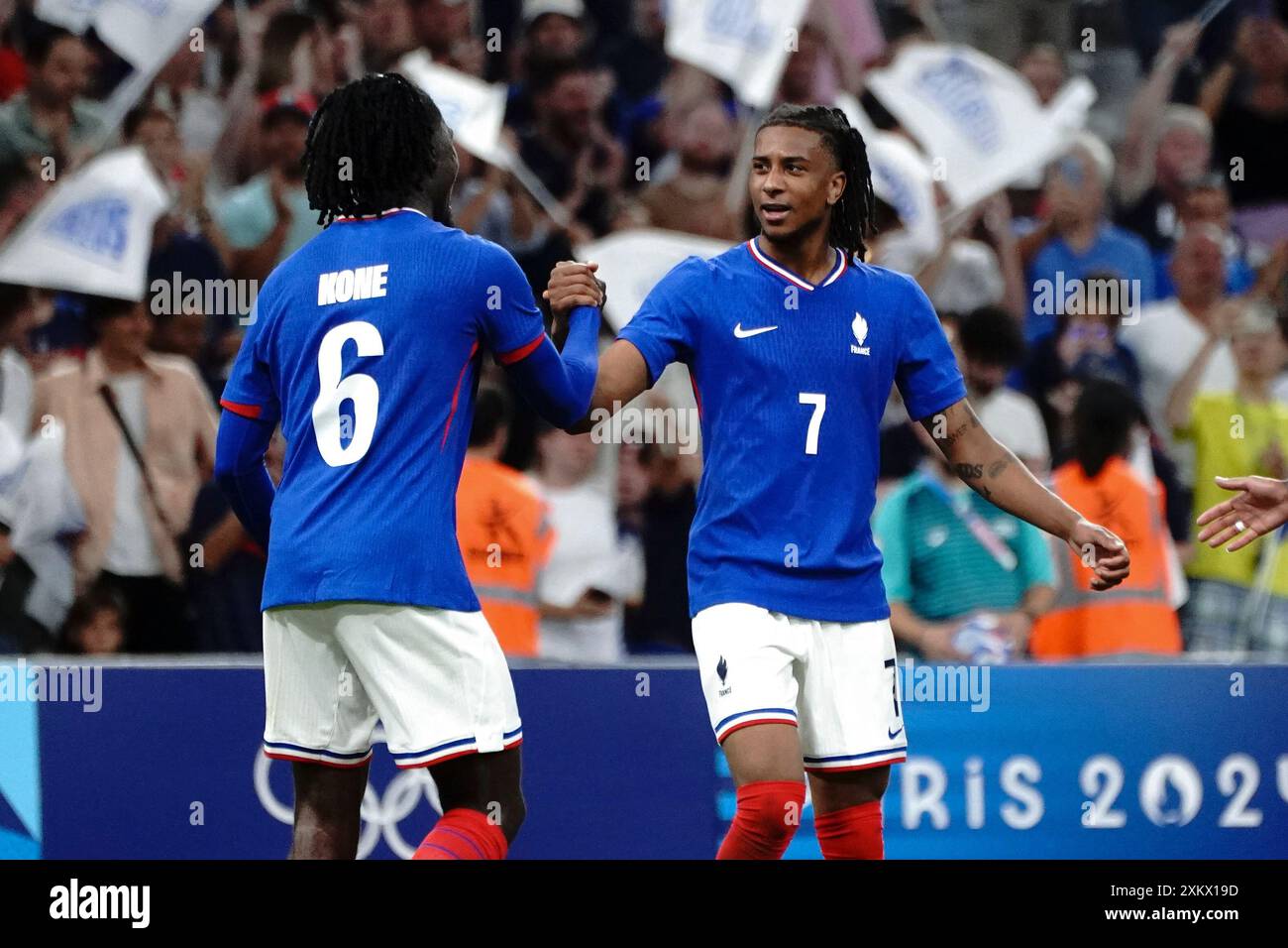 Michael Olise (France) celebrates his goal with Manu Kone during the ...
