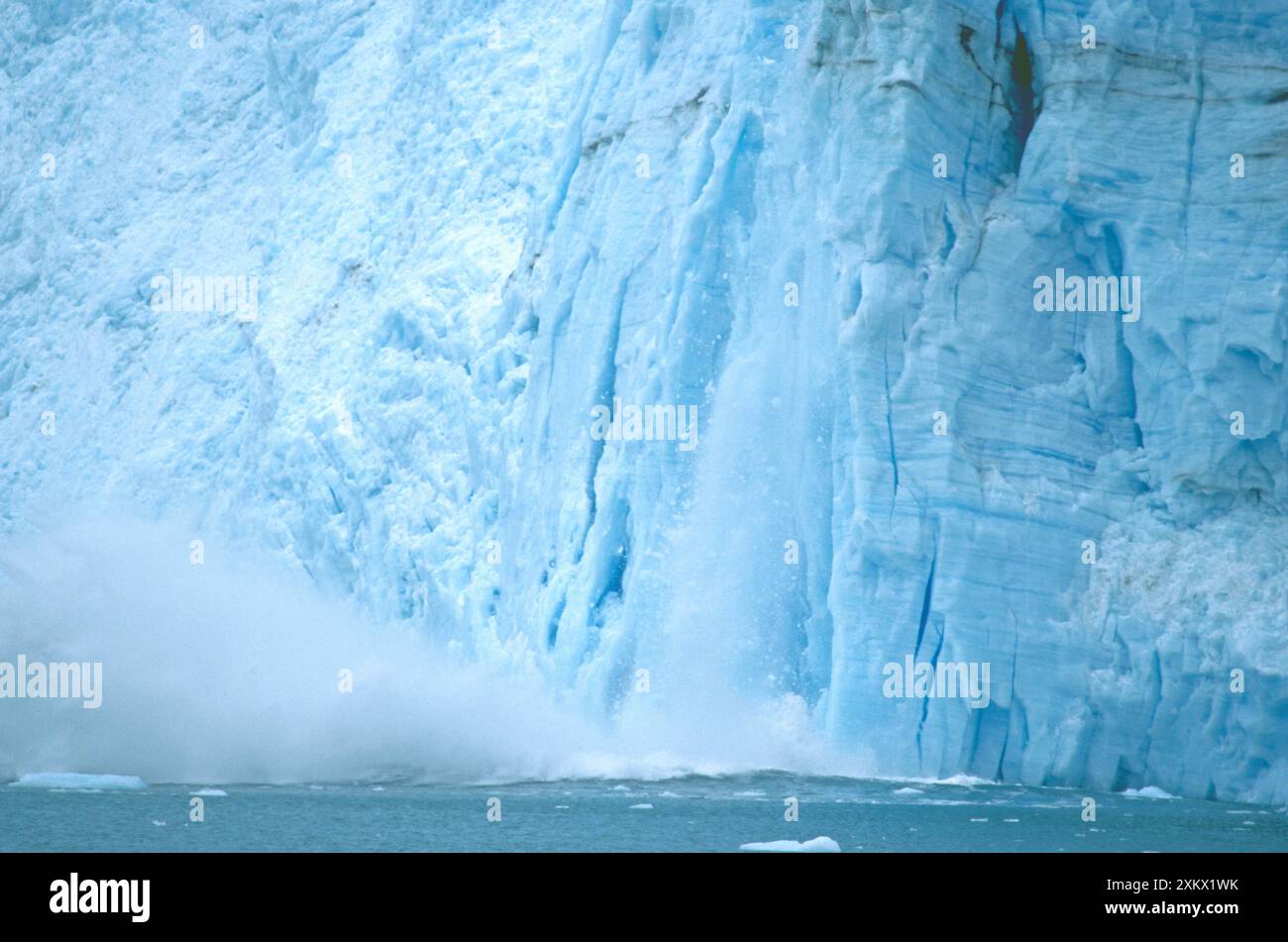 GLACIER calving - ice breaks off from face of glacier Stock Photo - Alamy