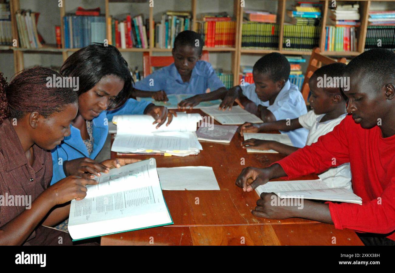 School children reading books, Uganda, Africa Stock Photo - Alamy