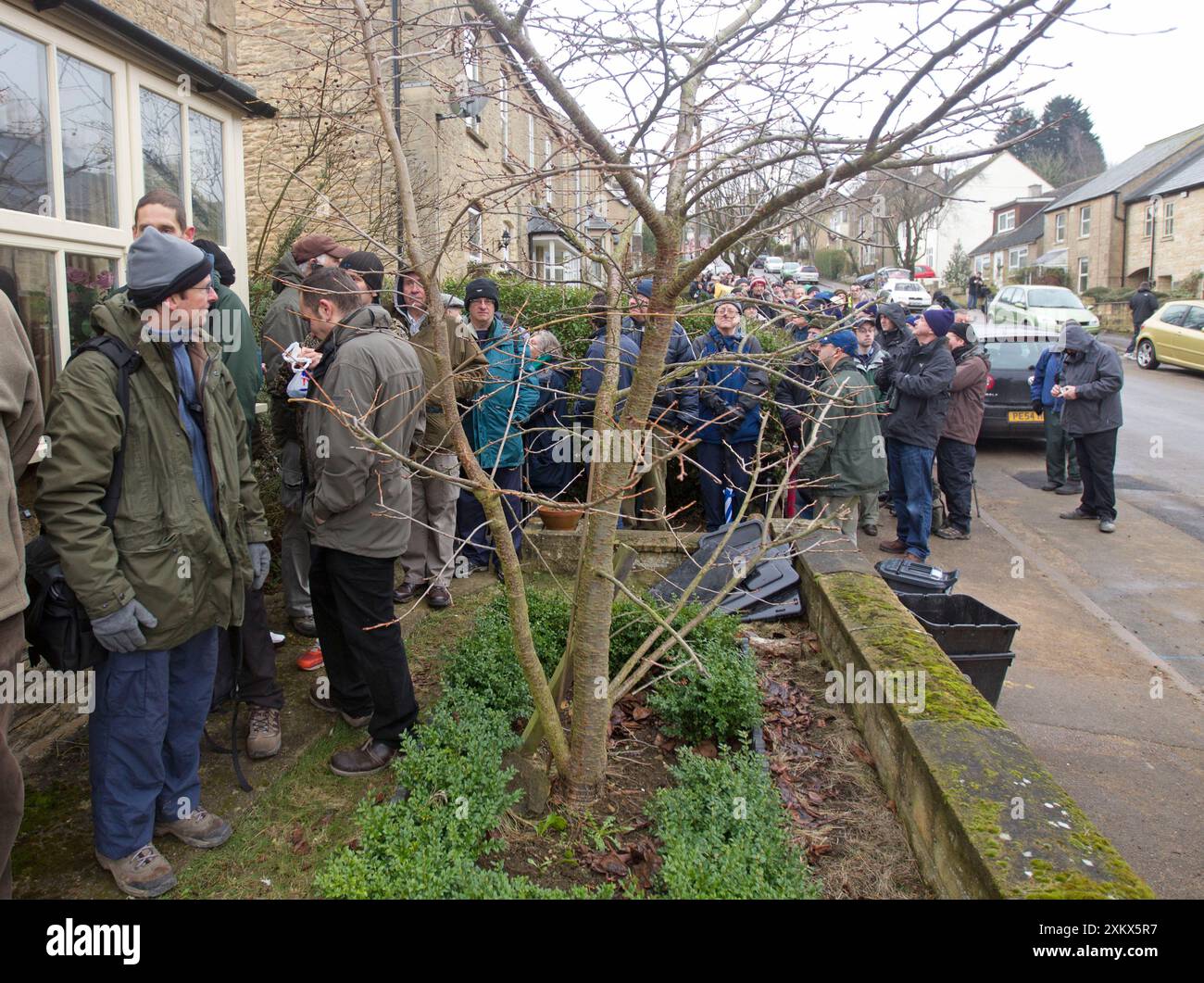 Bird Watchers and Twitchers - queueing in a residential Stock Photo - Alamy