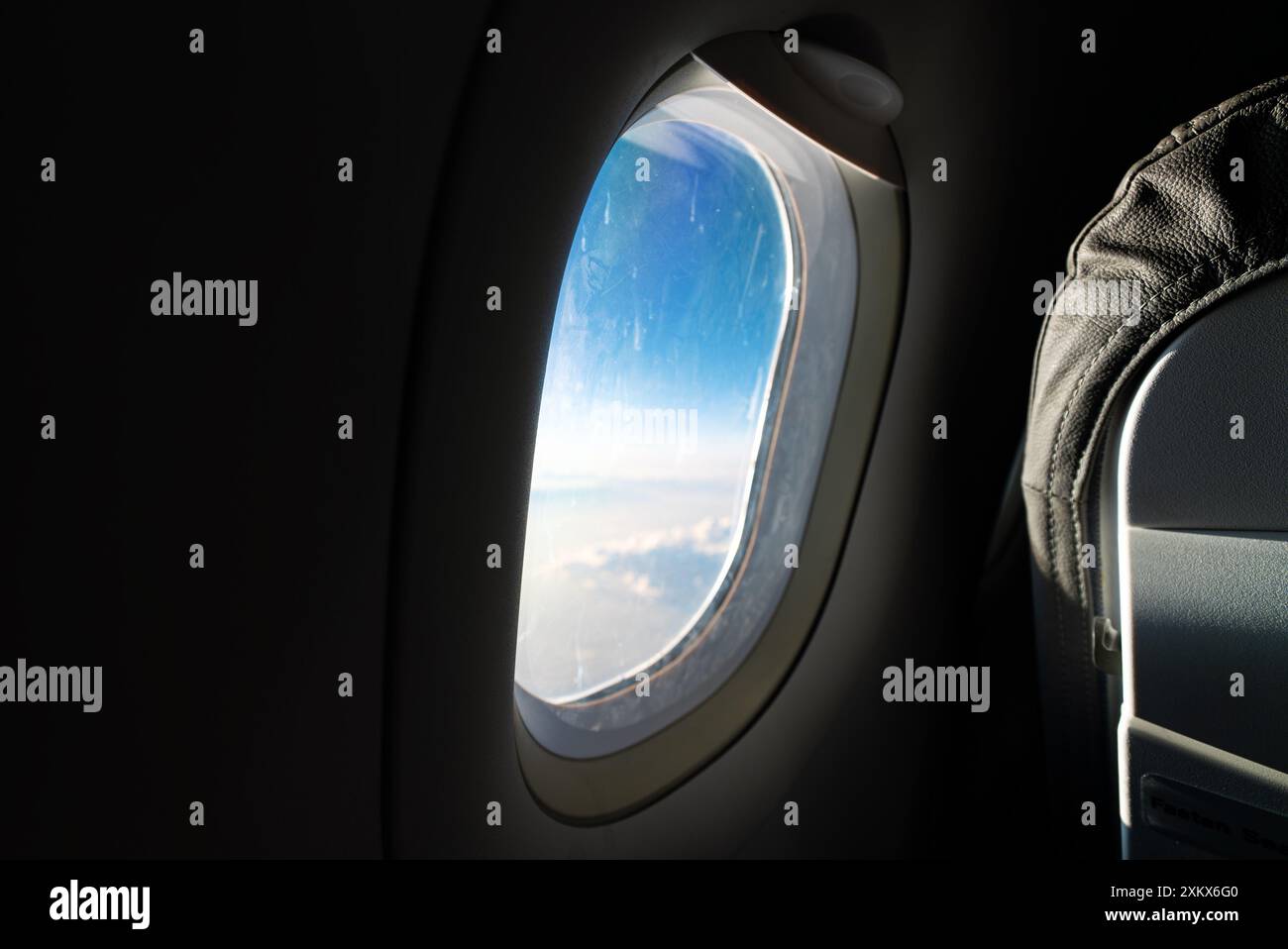 Airplane window. View from inside the cabin Stock Photo - Alamy