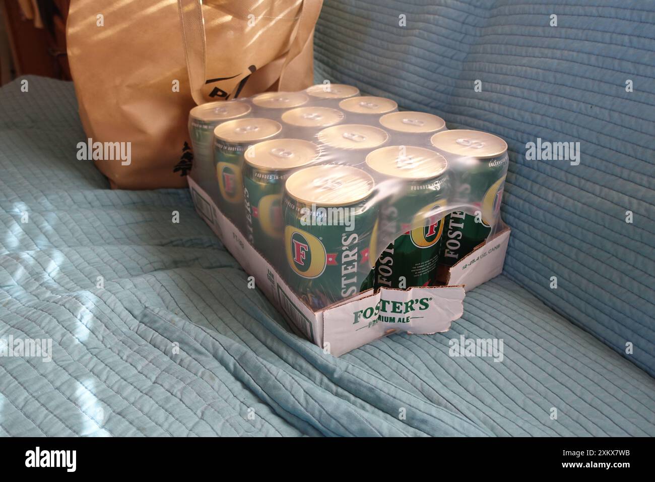 Fosters "Oil Cans" in a bulk flat Stock Photo - Alamy