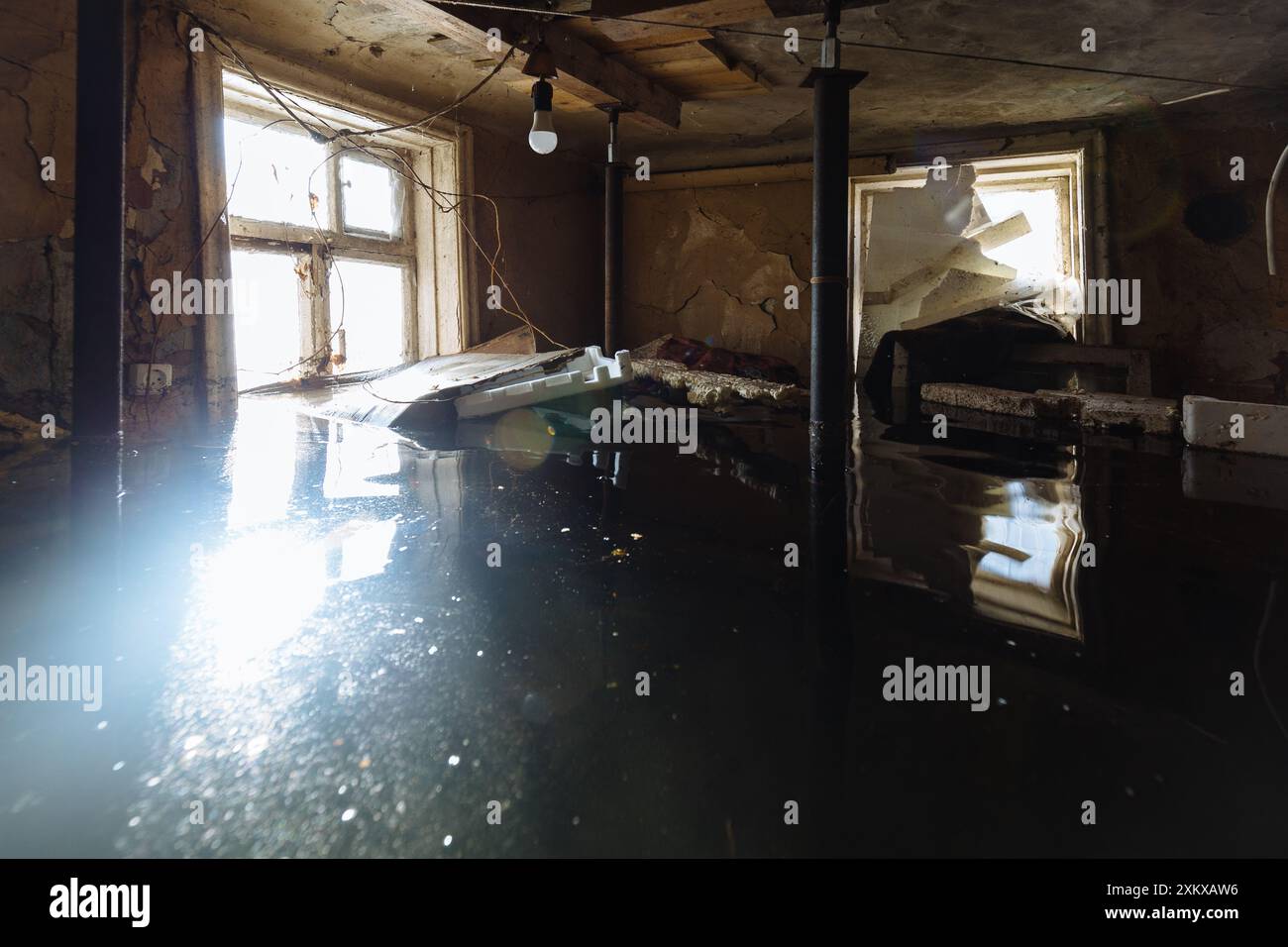 Flooded old house interior. Natural disaster concept Stock Photo - Alamy