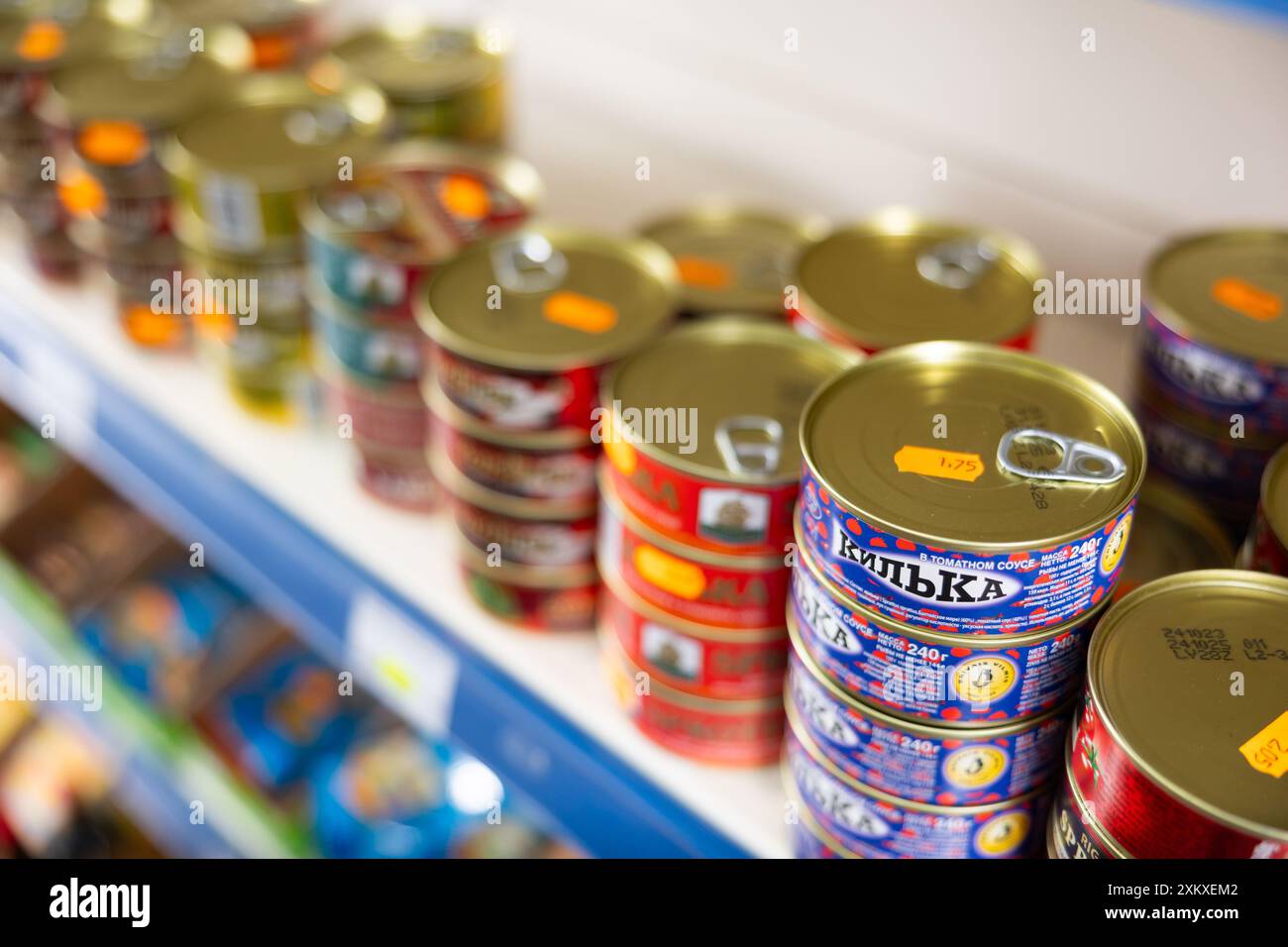 Russian goods store shelves have wide range of canned sprats in oil and ...