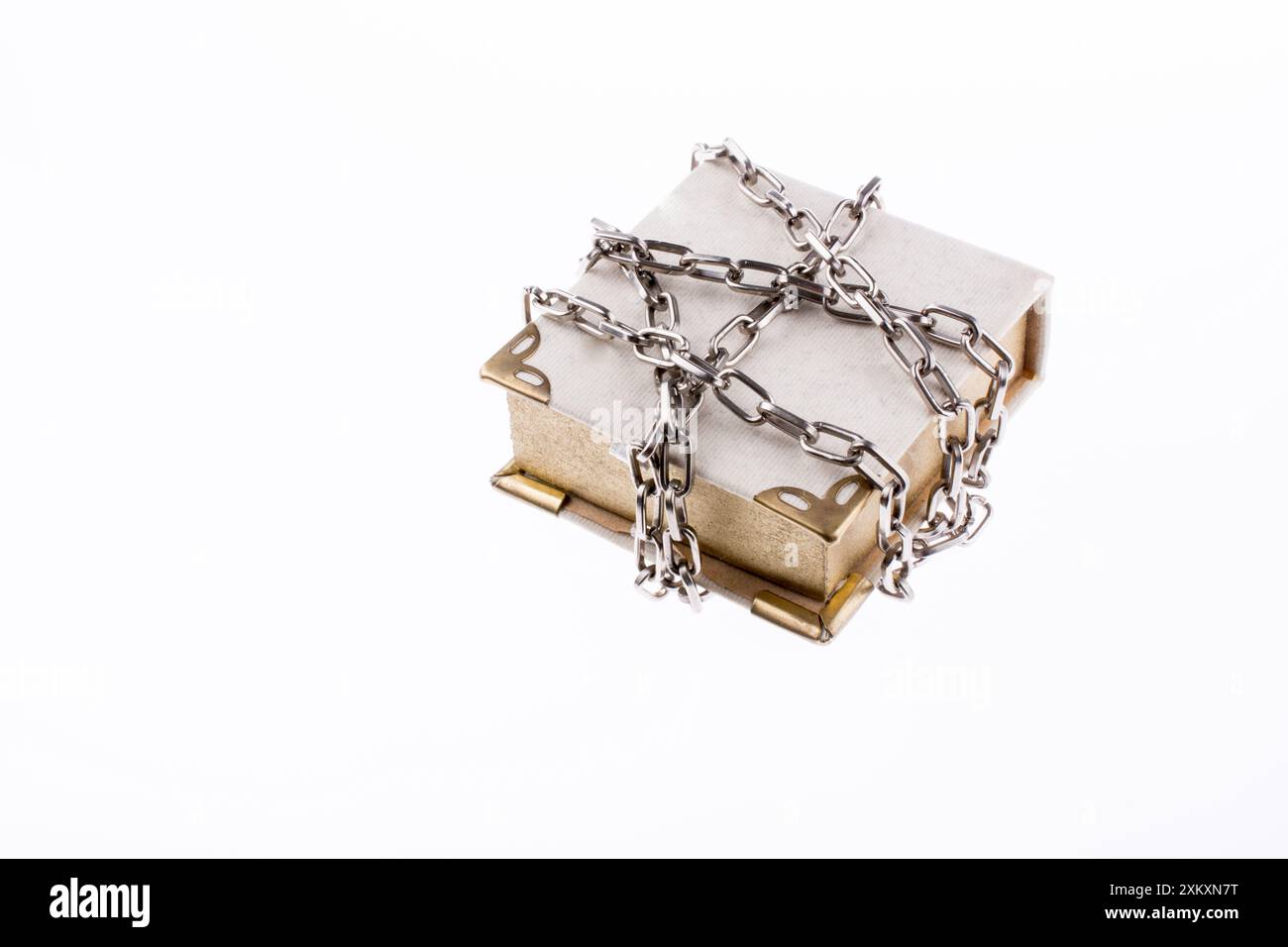 Chained book on white background Stock Photo - Alamy