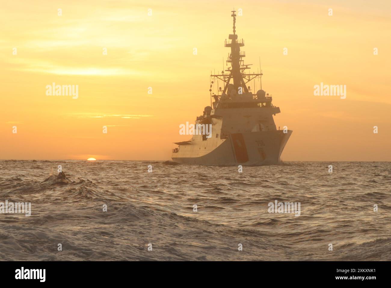 Coast Guard Cutter Stone steams in the Atlantic Ocean at sunset, July 1 ...