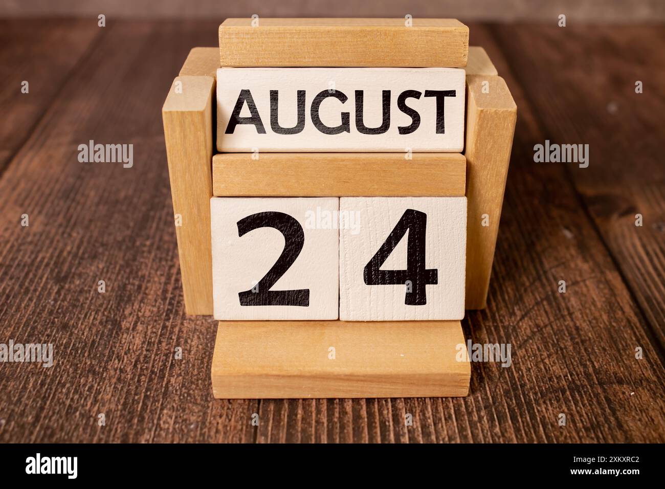 August 24 calendar date text on wooden blocks with blurred background ...