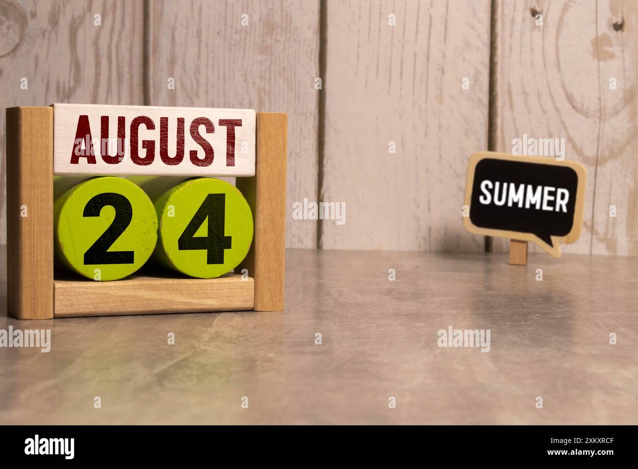 August 24 calendar date text on wooden blocks with blurred background ...