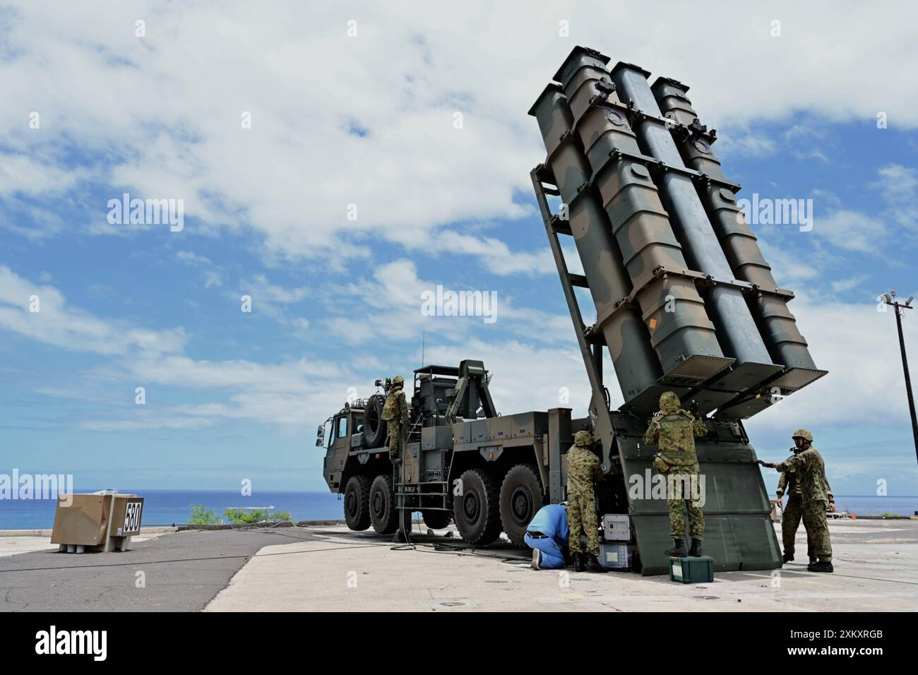 Soldiers from the Japan Ground Self Defense Force fire Type 12 Surface ...