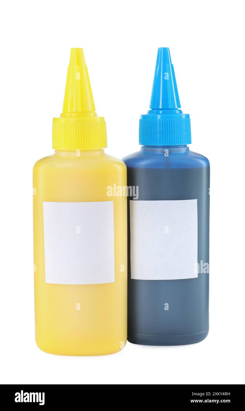 Bottles of different printer ink isolated on white Stock Photo - Alamy
