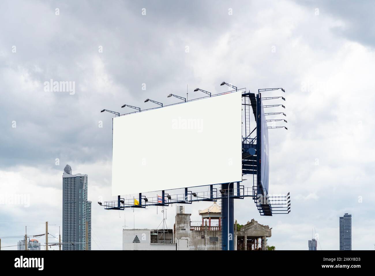 Outdor advertising in the city, mockup. Large billboard on roof top of ...