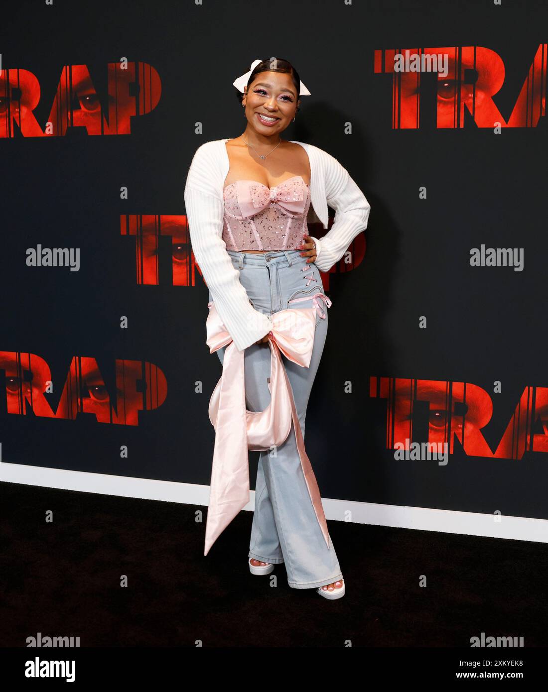 Azaila Jules arrives on the red carpet for the "Trap" world premiere at ...
