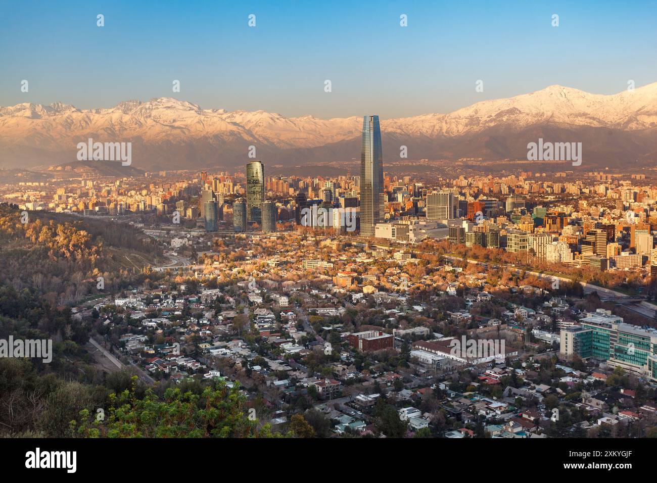 The city and the Cordillera de los Andes mountains covered with snow in ...