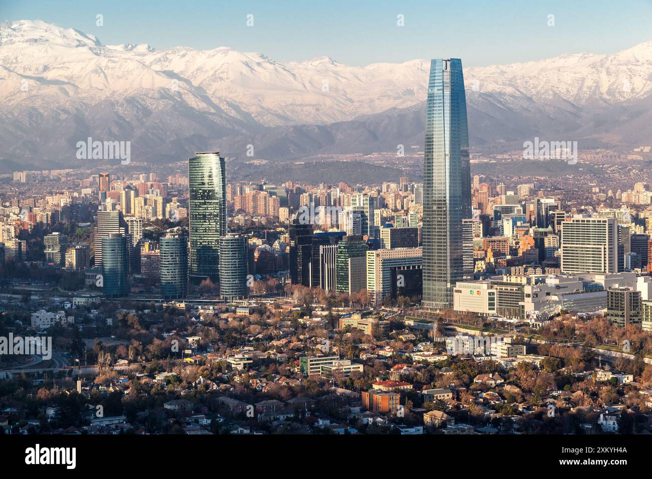 The city and the Cordillera de los Andes mountains covered with snow in ...