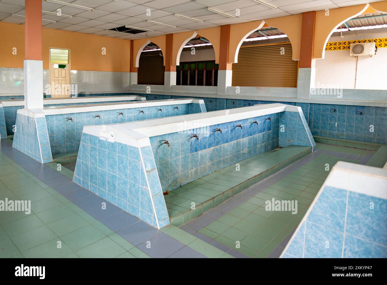 A Wadhu facility, a dedicated space for ritual washing (wudu) before ...