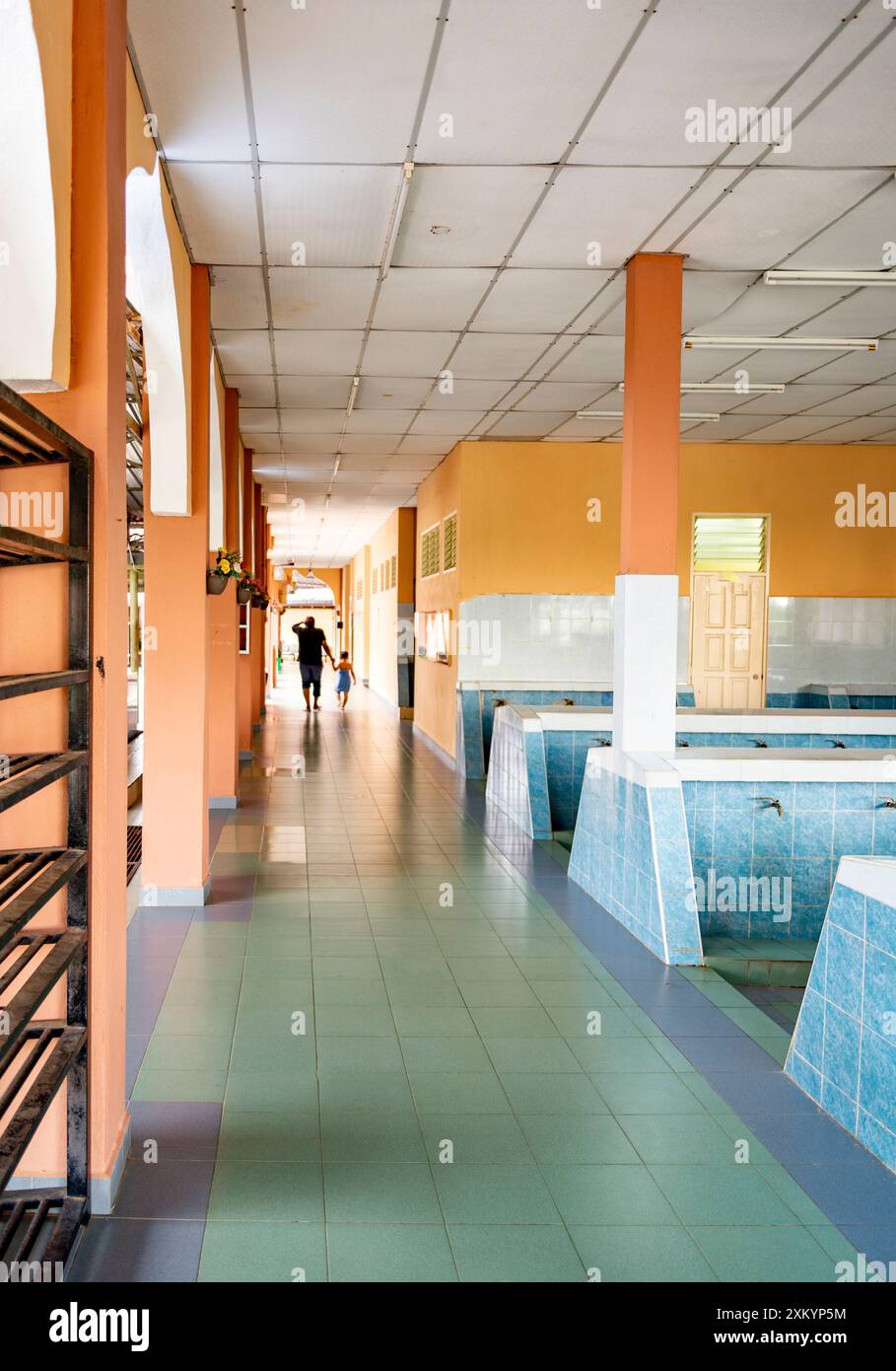 A Wadhu facility, a dedicated area for ritual washing before prayer. an ...