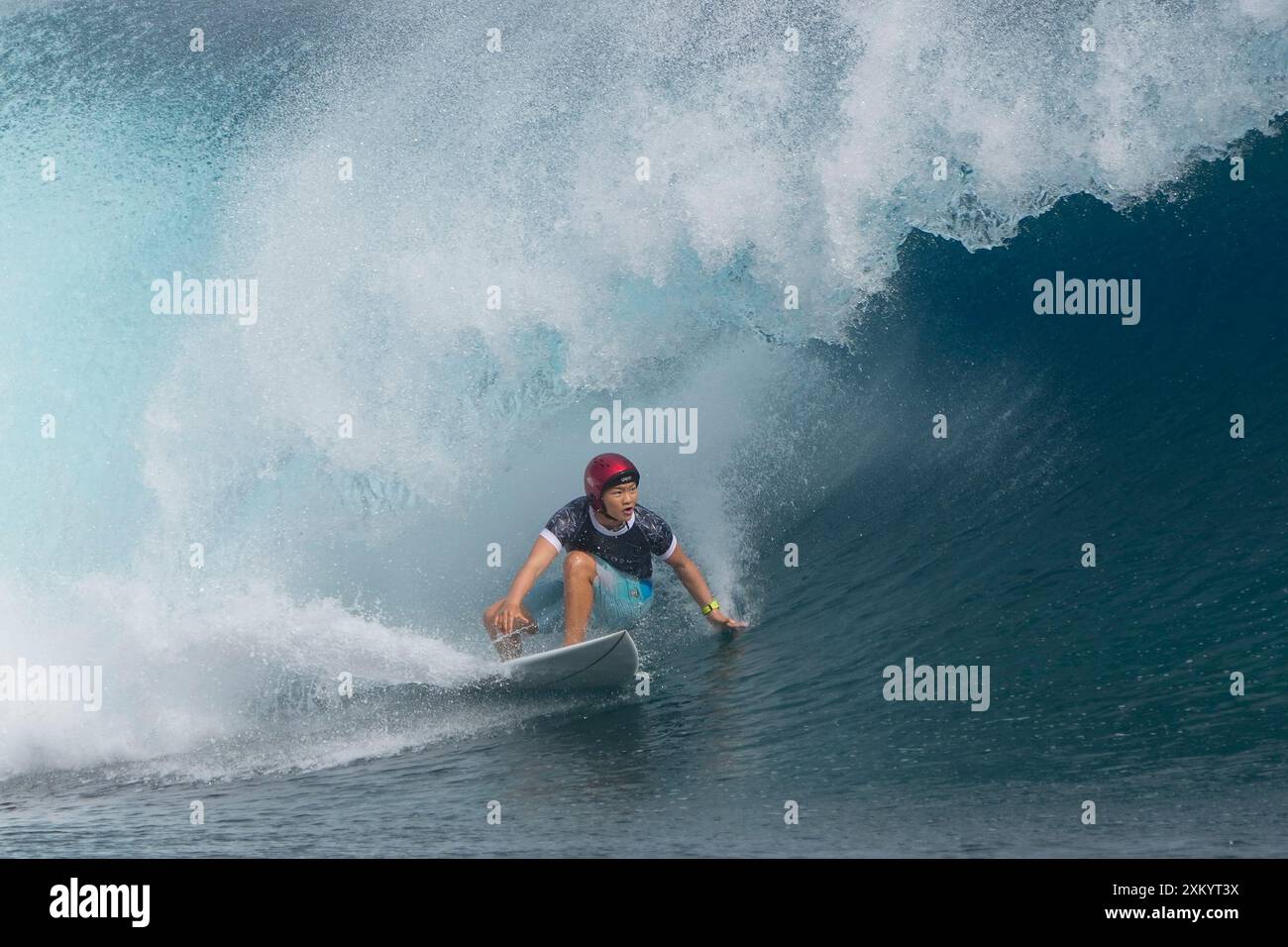 Yang Siqi, of China, surf during a training day ahead of the 2024 ...