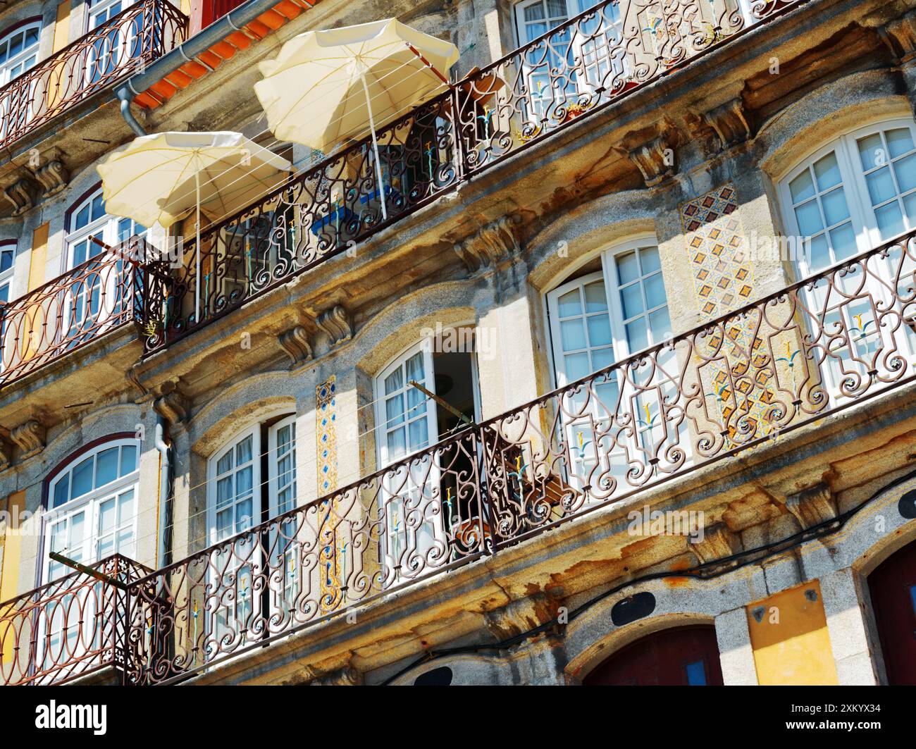 Lace balconies of old houses in Porto, Portugal. Porto is one of the ...