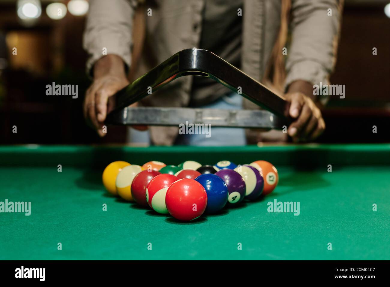 Cropped shot of unrecognizable African American guy holding triangular ...