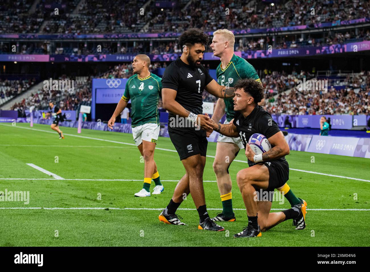 Moses Leo (New Zealand) celebrates a try with Fehi Fineanganofo, Rugby ...