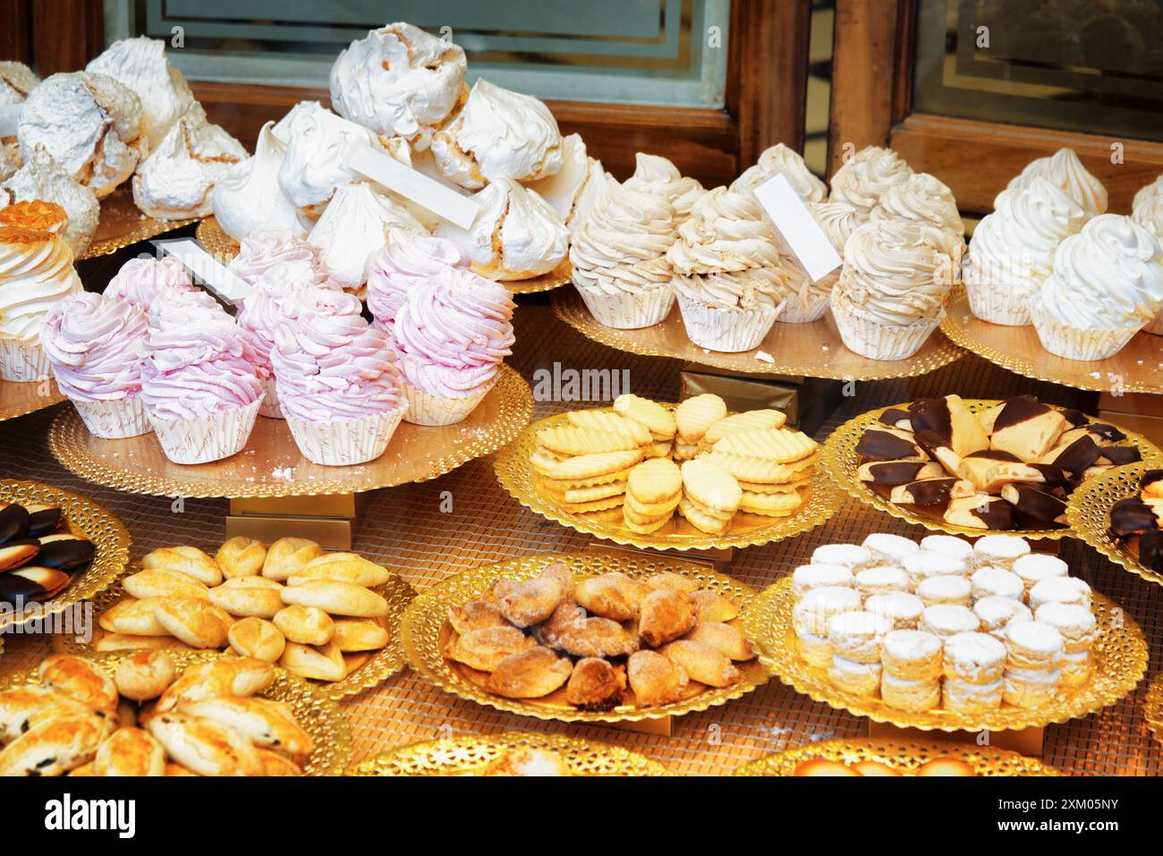Meringues in shop window of confectionery, Barcelona, Spain Stock Photo ...