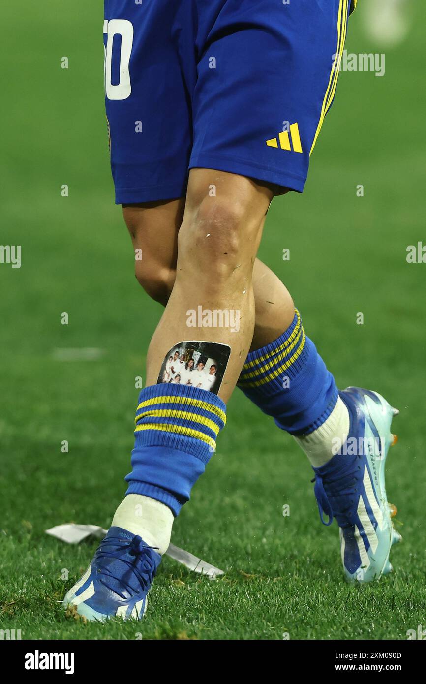 Detail of a family photograph placed as a shin guard on the Boca ...