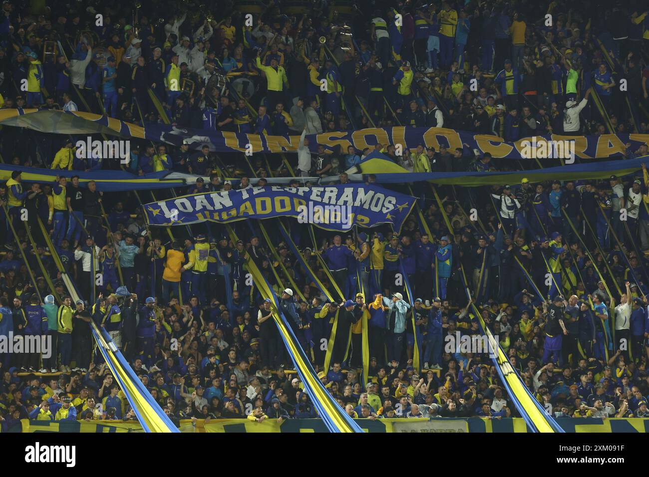 Boca Juniors’ supporters cheer for their team during the Copa ...