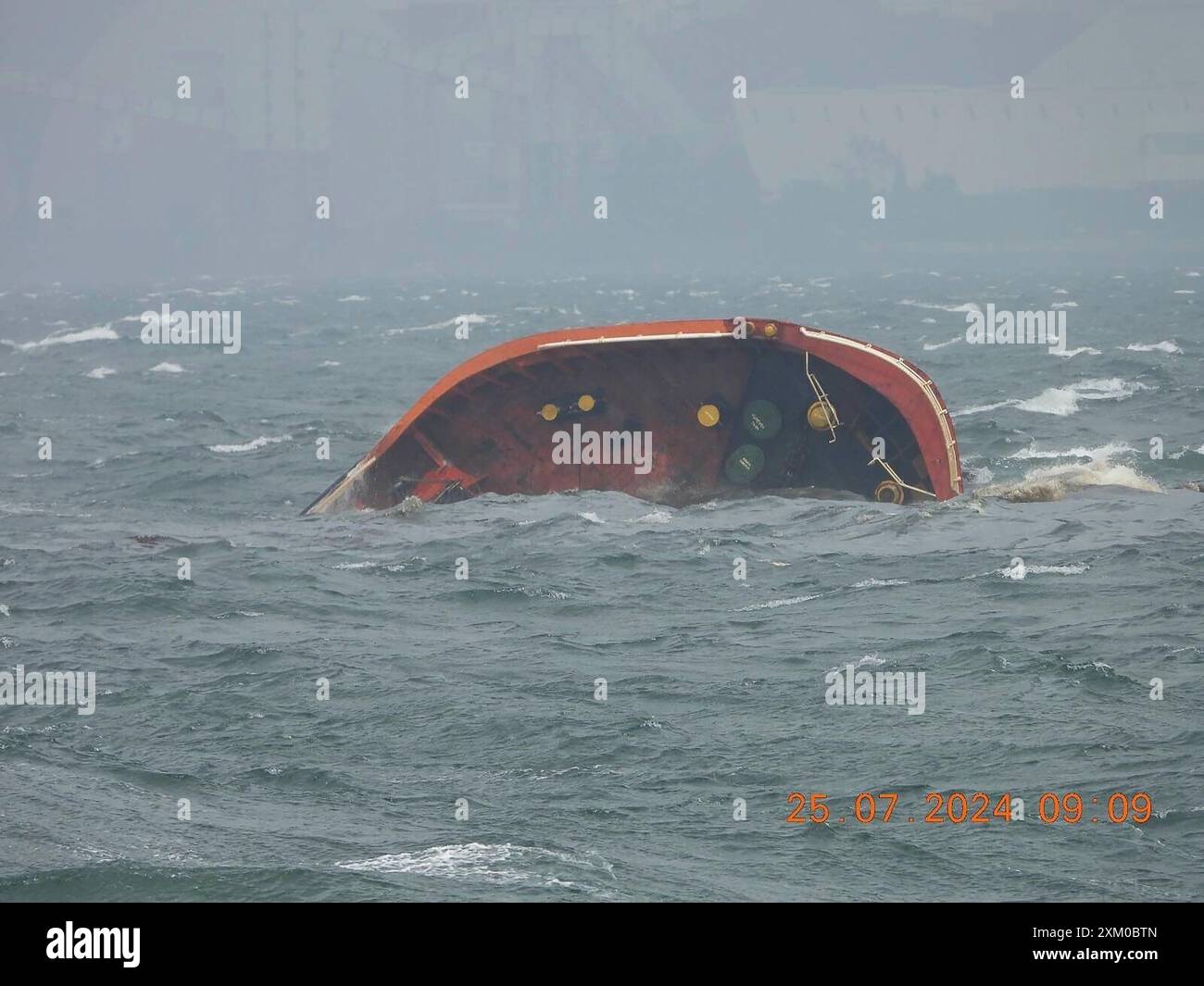 In this photo provided by the Philippine Coast Guard, Philippine ...