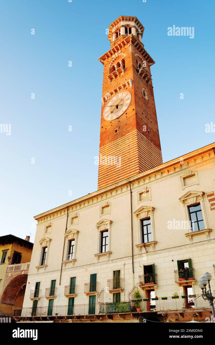 The Torre dei Lamberti is a clock tower in Verona, Italy Stock Photo ...