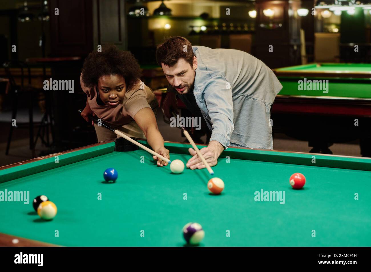 Woman bending over table hi-res stock photography and images - Alamy