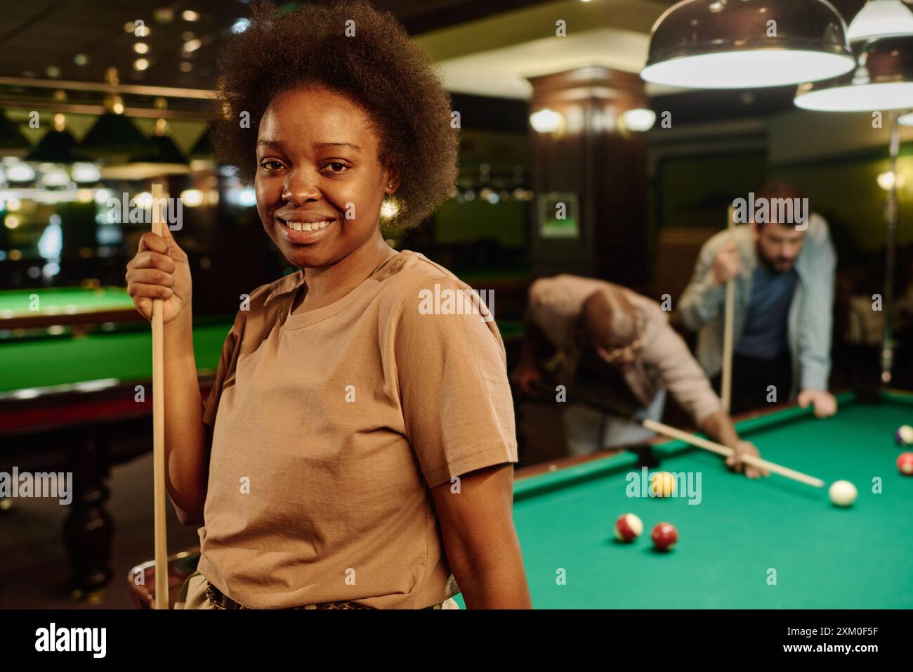 Woman play billiards hi-res stock photography and images - Alamy