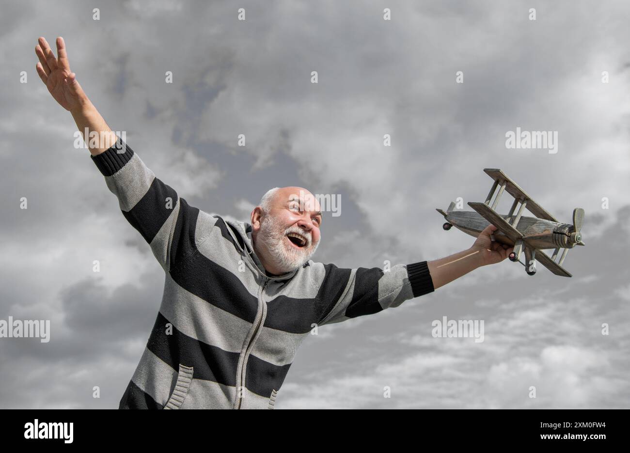 happy retirement. retired granddad with toy. retired old man outdoor ...